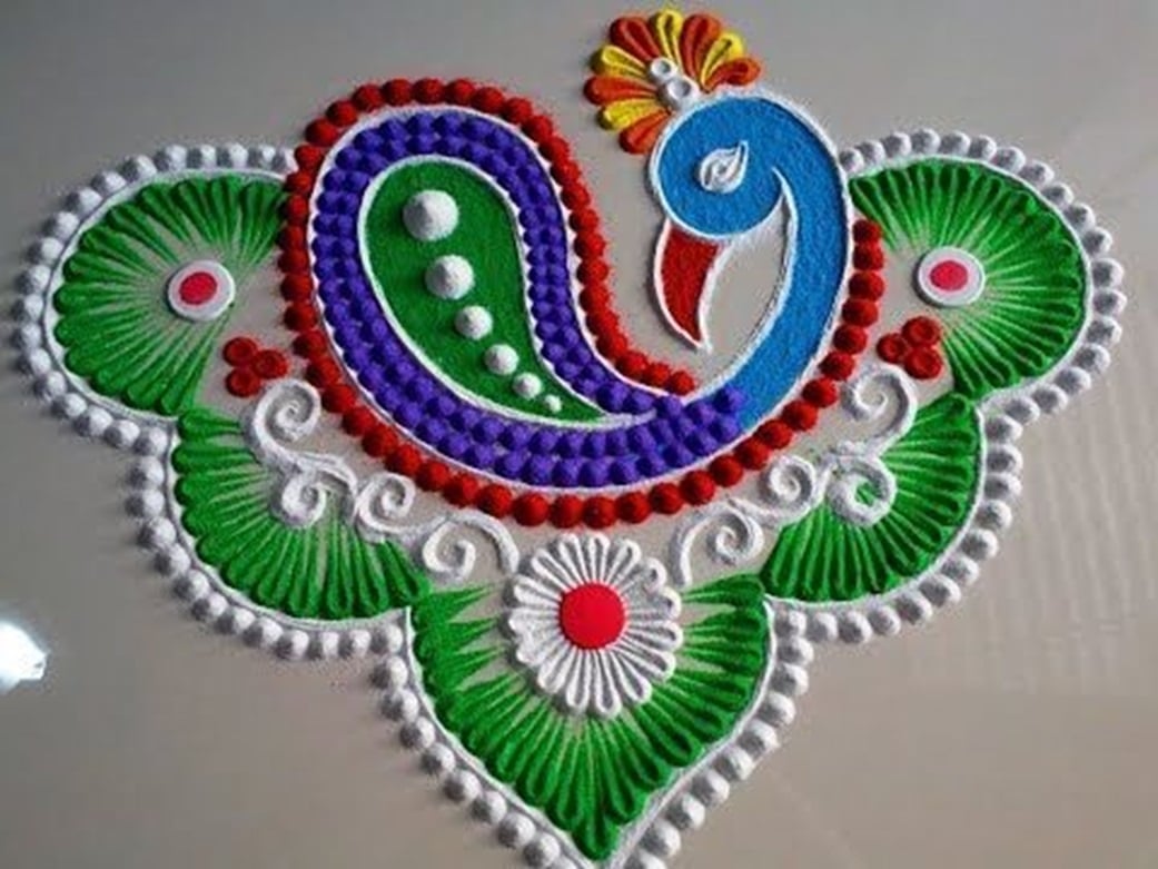 15 Peacock Kolam Rangoli Designs Ideas for Pongal 2025